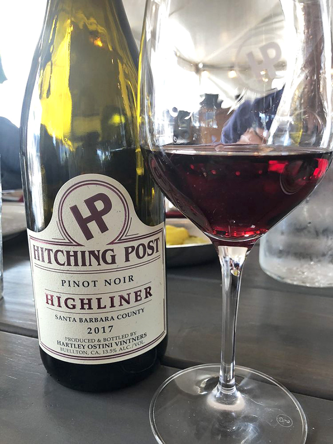 Their house Pinot Noir&mdash;bottled poetry from Santa Barbara County. The perfect liquid companion to anything emerging from those oak-fired grills.