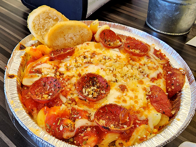 Pizza mac and cheese proves that two of humanity's greatest culinary achievements can coexist beautifully on one plate. Innovation at its finest.