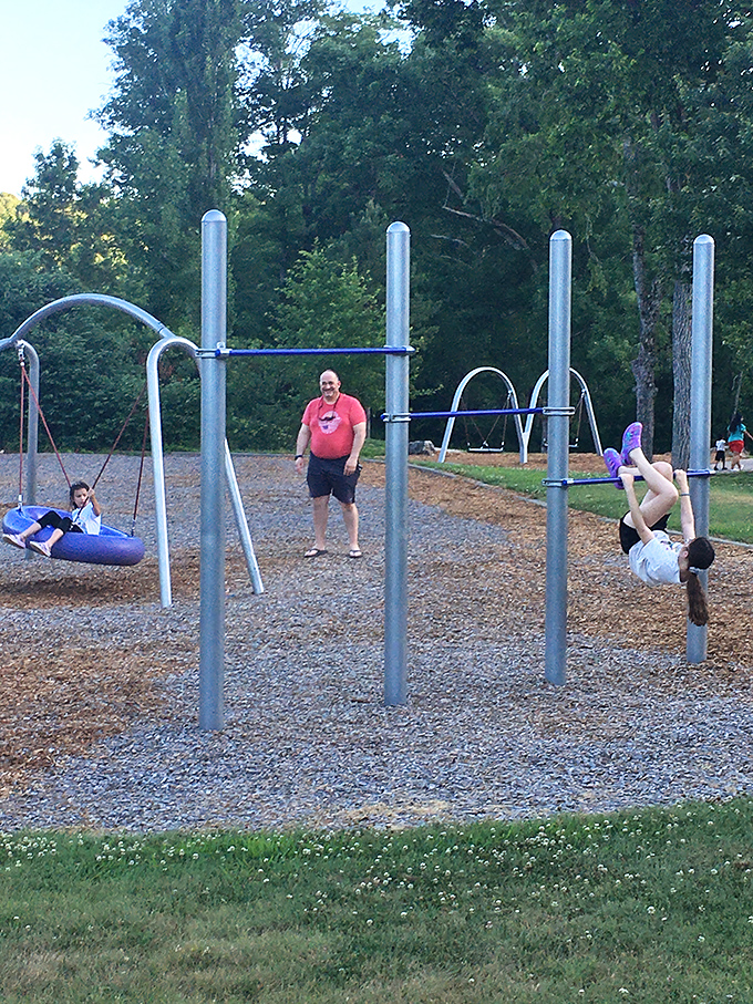 Playground physics in action! These modern swings prove that simple pendulum motion still creates more genuine smiles than any digital entertainment.