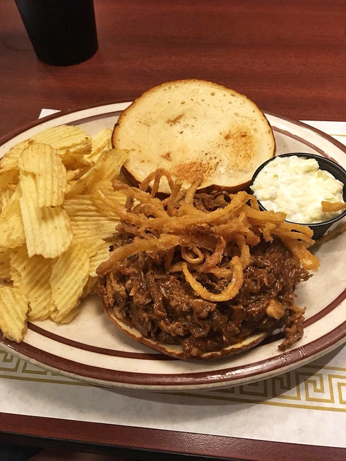 A pulled pork sandwich that doesn't need gimmicks or fusion confusion&mdash;just honest smoke, tender meat, and the structural integrity to deliver it to your face.