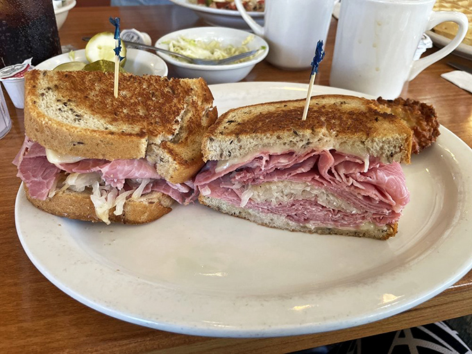 A proper Reuben sandwich&mdash;the kind that requires both hands and several napkins. That sauerkraut isn't just tangy&mdash;it's transformative.