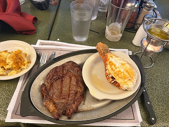 The ultimate power couple: a perfectly grilled ribeye alongside a butter-drenched lobster tail &ndash; date night never looked so delicious.