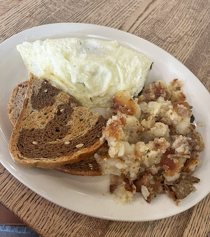 The humble egg, transformed into a cloud-like revelation. Simplicity executed with precision is the hallmark of breakfast greatness.