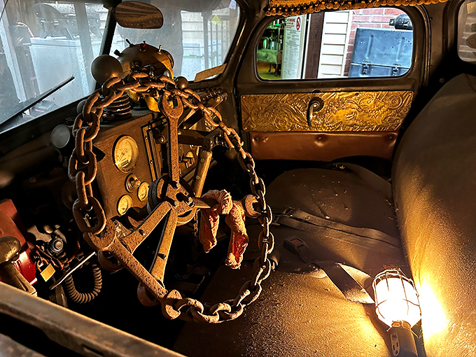 The driver of this vehicle clearly had a grip on the unusual—a chained steering wheel that suggests this isn't your everyday Sunday drive.