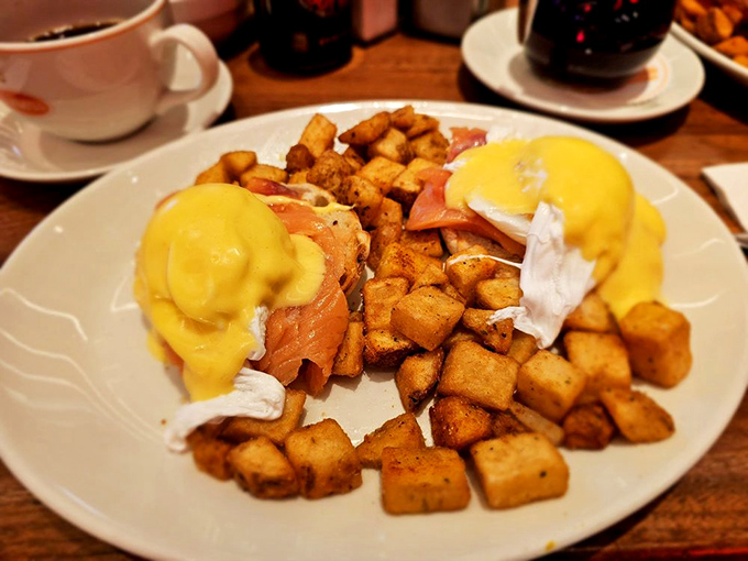 Eggs Benedict with salmon: breakfast elevated to an art form, with hollandaise sauce that should be declared a national treasure.
