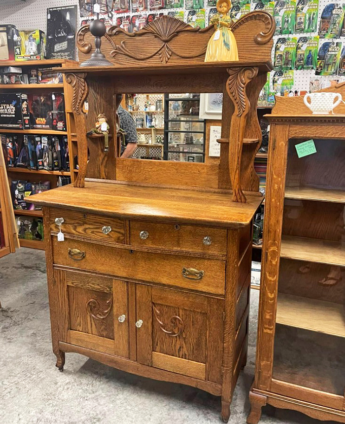 This oak sideboard with beveled mirror has witnessed a century of family dinners. Your grandmother had one just like it.