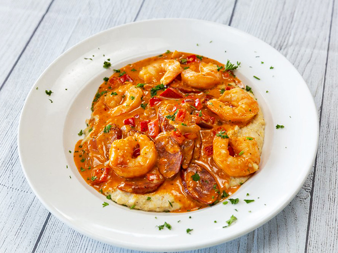 Shrimp and grits&mdash;where plump Gulf shrimp swim in a savory sauce atop creamy stone-ground grits&mdash;the South's gift to comfort food enthusiasts everywhere.