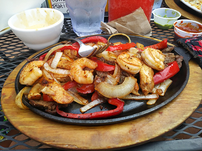 Sizzling shrimp fajitas that announce their arrival with a sound and aroma that turns every head in the restaurant.
