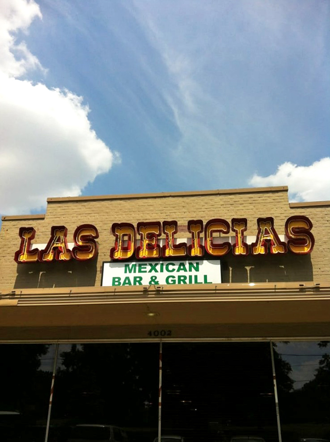 The Las Delicias sign stands proud against the Memphis sky, a beacon for hungry travelers and locals alike. Some signs promise; this one delivers.