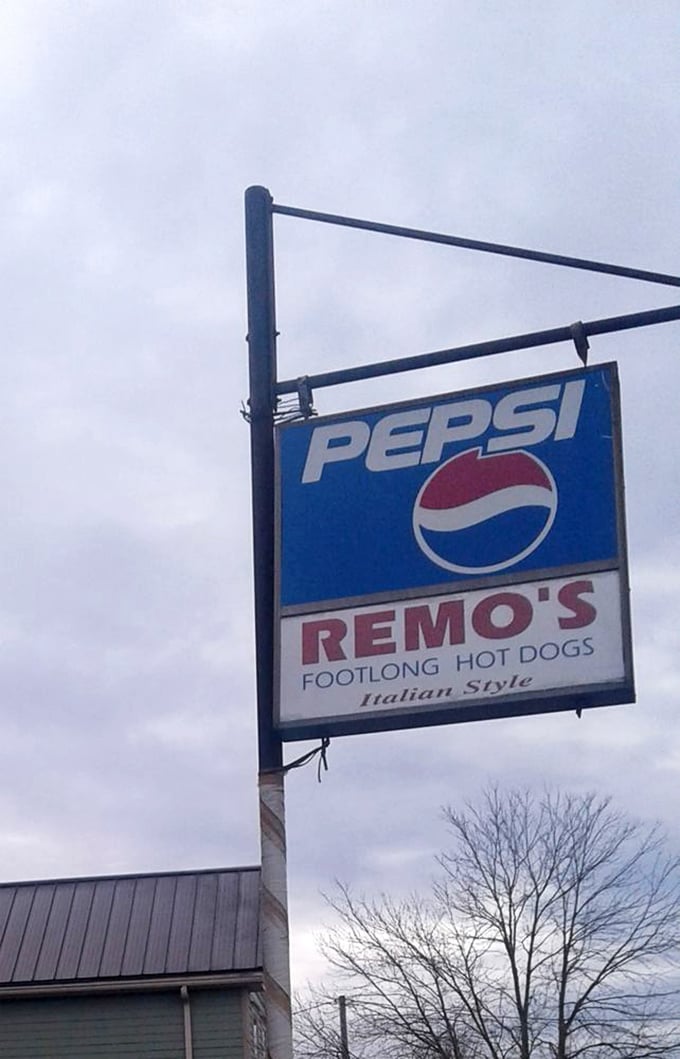 The sign stands as a beacon for hot dog aficionados, promising an experience that's remained deliciously unchanged while the world around it transforms.