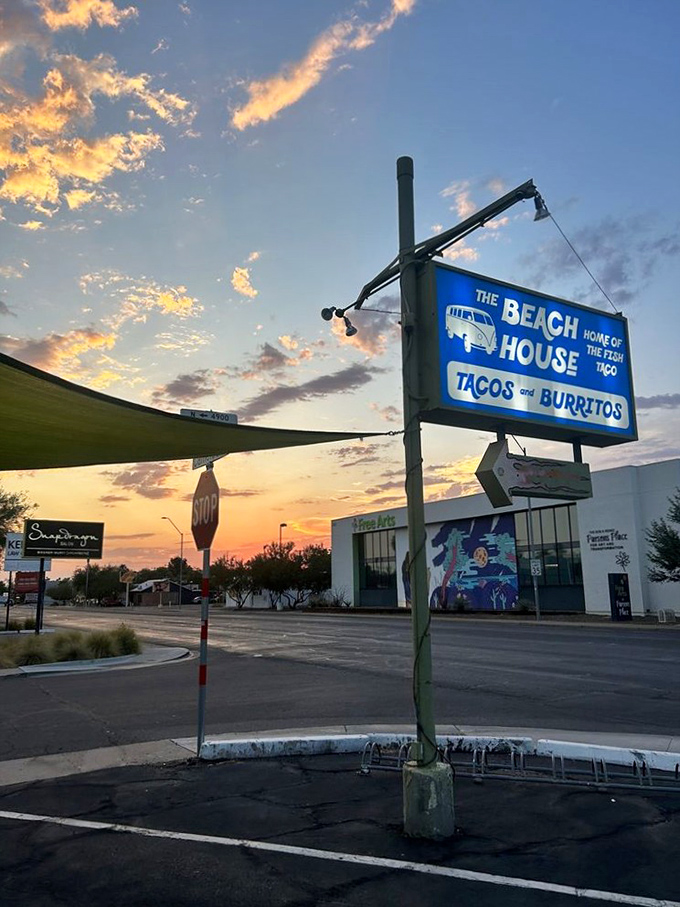 The sign against an Arizona sunset &ndash; nature's way of highlighting your next great meal destination.