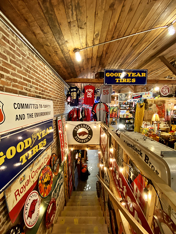 The stairway to treasure heaven. Vintage signs line the descent into more shopping adventures&mdash;proof that good things come to those who explore.