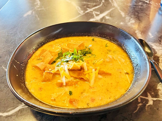 The chicken tender soup &ndash; where comfort meets kick. Like a warm hug that occasionally reminds you it knows karate.