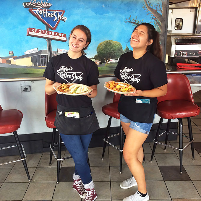 The smiles say it all&mdash;when servers love the food they're serving, you know you've found the real deal.