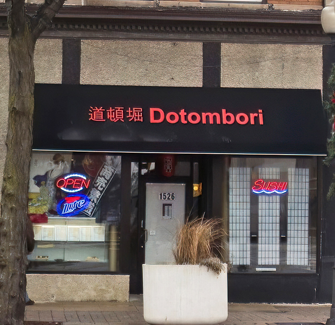 By day, it's just another storefront. By night, the neon glow transforms Dotombori into a beacon for sushi lovers across Chicagoland.