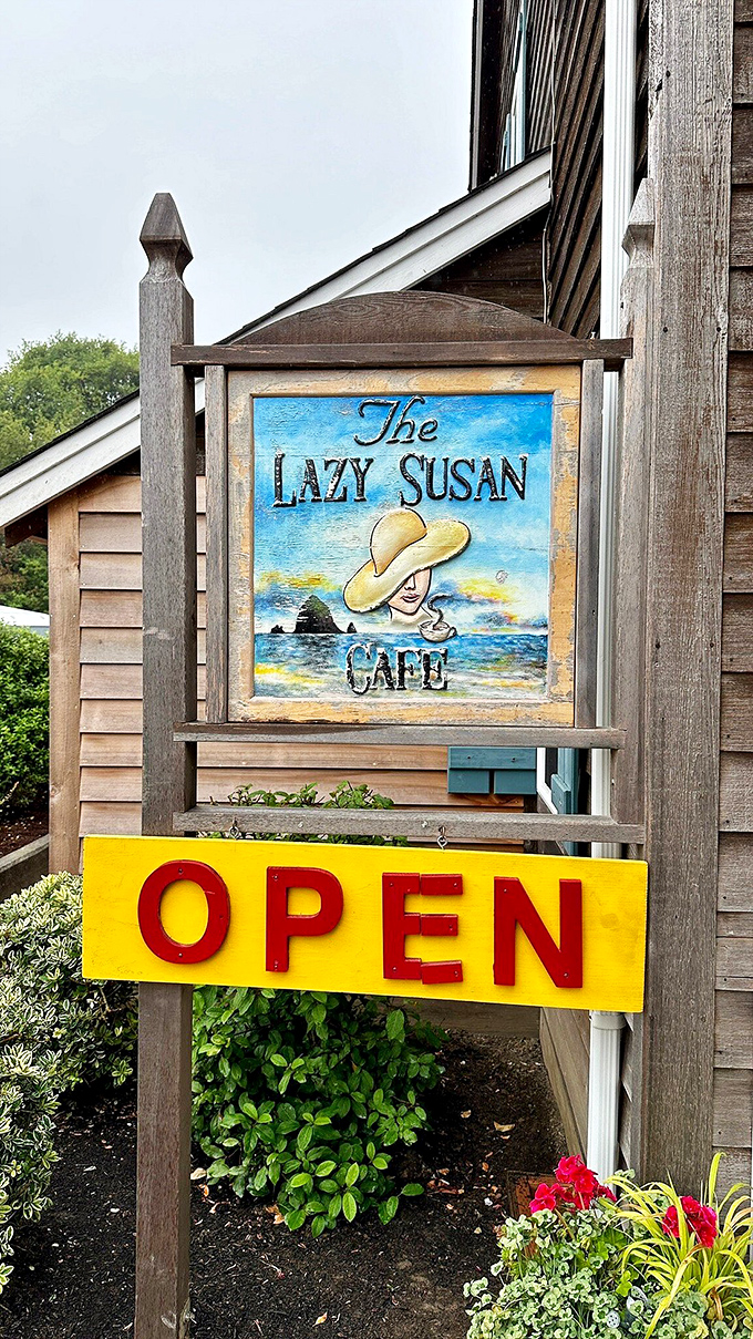 The sign that promises breakfast salvation to hungry travelers&mdash;complete with Haystack Rock in the background for proper coastal context.