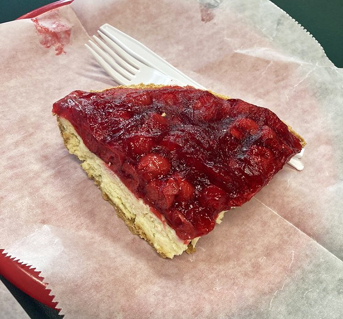 This strawberry cheesecake slice isn't just dessert; it's the grand finale that makes you want to start the whole meal over again just to reach this sweet conclusion.