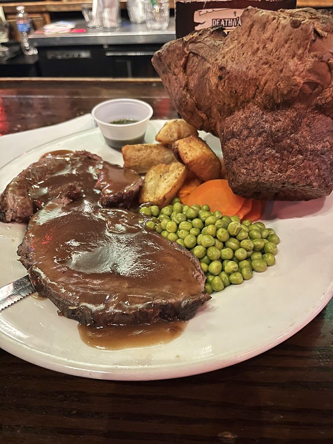 The Sunday roast&mdash;a magnificent mountain of meat, Yorkshire pudding, and gravy. This isn't just dinner; it's a British institution on a plate.