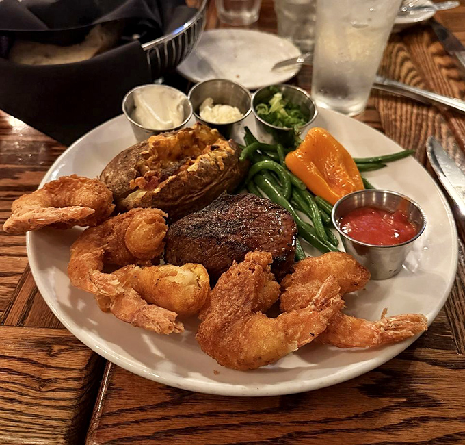 Land meets sea in perfect harmony &ndash; golden fried shrimp and a tender steak create the ultimate "why choose when you can have both?" moment.