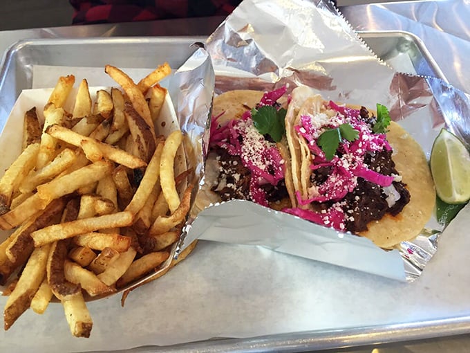 A tray that answers life's most important question: "Why choose between perfect tacos and golden fries when you can have both?" Genius level problem-solving at its finest.