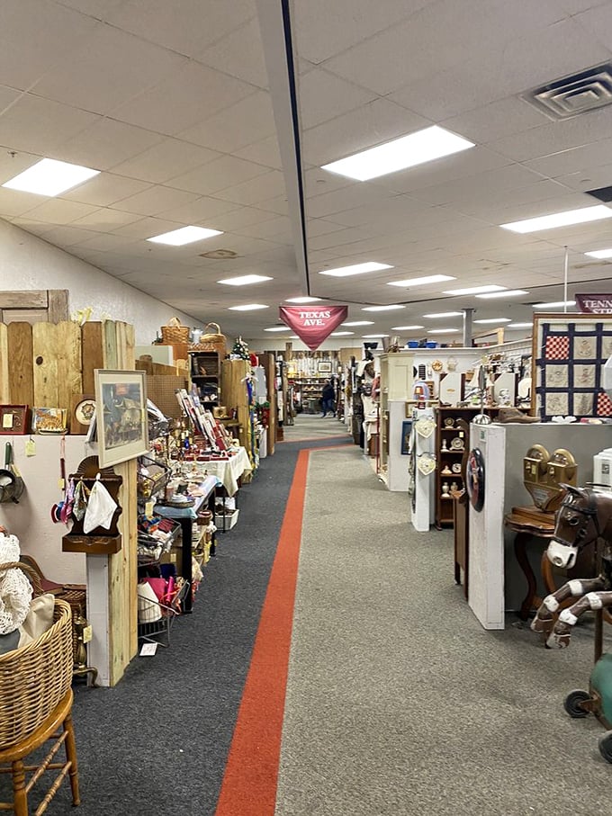 Follow the red-lined path like a treasure map through vendor booths. The antique mall's version of the yellow brick road.
