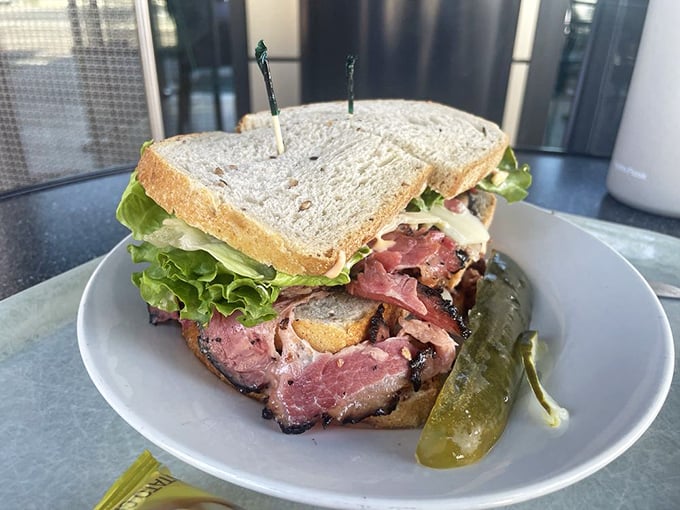 The Triple Decker &ndash; not just a sandwich but an engineering marvel. Layers of meat and cheese create a skyscraper of flavor that demands respect.