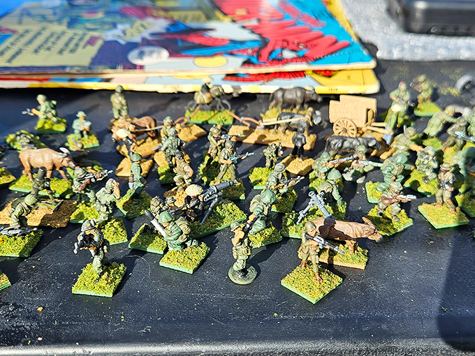 Miniature soldiers stand at attention, a tiny army of collectibles awaiting orders from their next commander-in-chief.