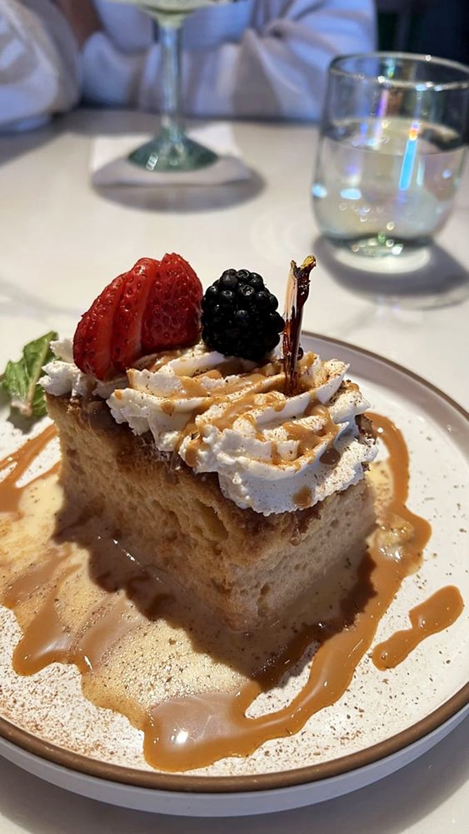 Tres leches cake that's more moist than saying the word "moist" in public. That caramel drizzle is performing a sweet ballet across the plate.