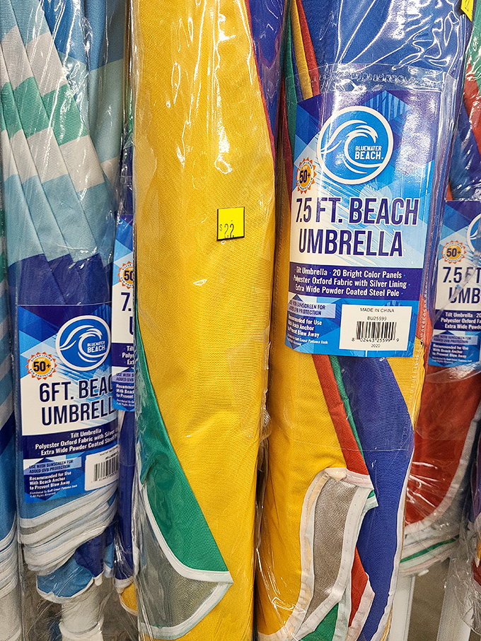 Beach umbrella battalion standing at attention! These colorful sun shields are ready for deployment against the fierce Alabama coastal sunshine.