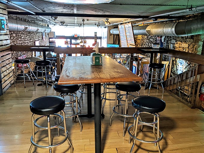 High-top tables and bar stools create the perfect perch for people-watching while contemplating your next french fry strategy.