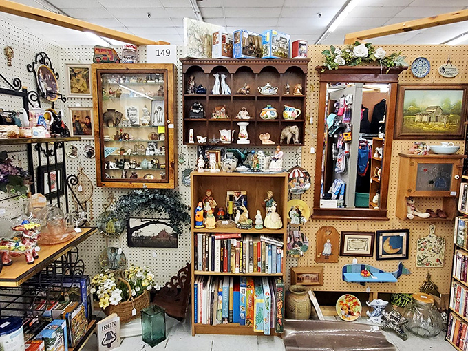 A booth that looks like your coolest aunt's china cabinet exploded in the best possible way. Figurines, frames, and forgotten treasures await.