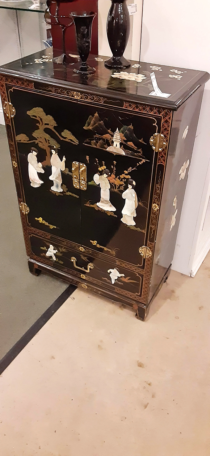 This isn't just a cabinet&mdash;it's functional art telling stories of distant lands while secretly judging your storage solutions at home.