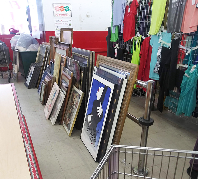 Framed art leaning casually against the wall, waiting for new homes. Someone's discarded decor becomes your conversation piece&mdash;all for pocket change.