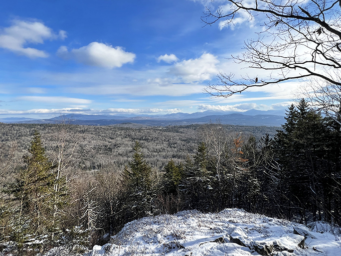 Winter in the White Mountains transforms familiar landscapes into something otherworldly, where every overlook becomes a masterclass in monochromatic beauty.