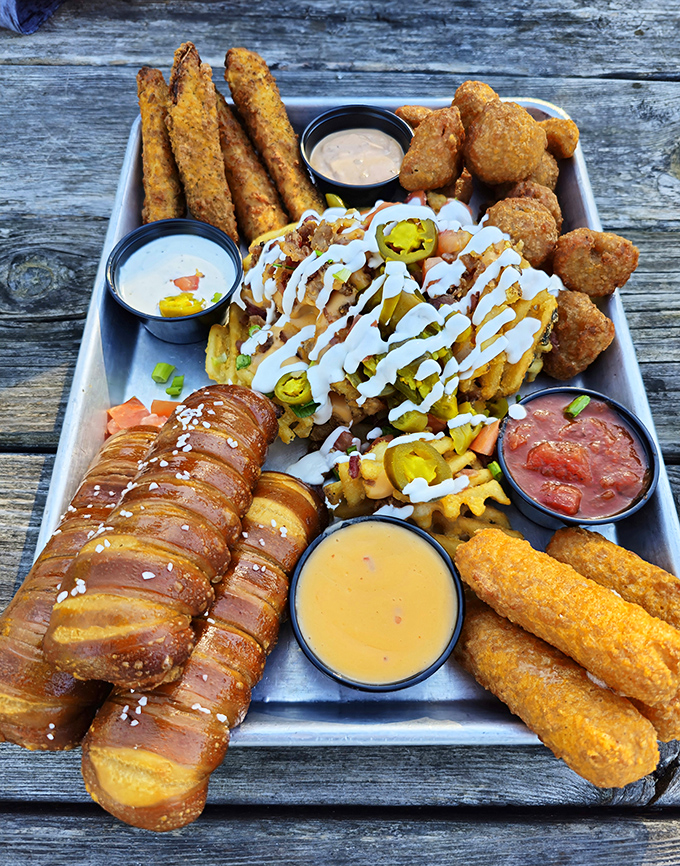 This shareable platter isn't just food&mdash;it's a choose-your-own-adventure of fried delights, pretzel dogs, and dipping sauces for every mood.