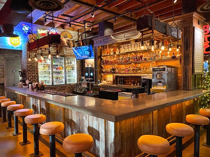 The saloon-style bar glows with amber promise. Those stools have witnessed countless celebrations, deals, and first dates.