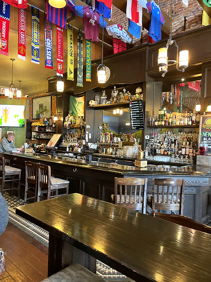 Not just a bar but a shrine to libations, where bottles stand at attention and taps await your command under the watchful gaze of international flags.