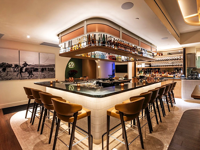 A bar designed for both serious drinking and serious conversation. Notice how the lighting makes everyone look like they're in a movie.