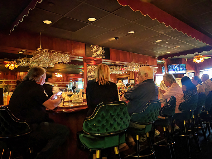 The bar where stories get better with each round. Green leather stools have witnessed decades of celebrations, deals, and first dates.