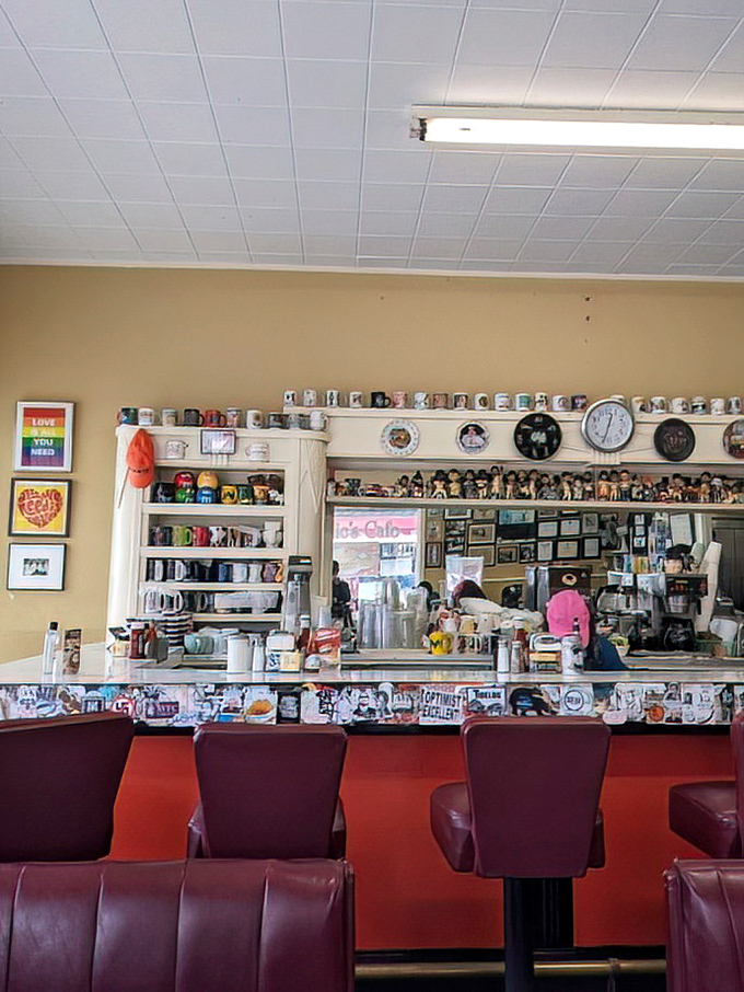 The command center of breakfast dreams. This counter view showcases Eddie's impressive mug collection, where each ceramic vessel tells its own story.