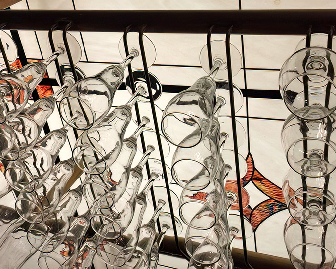 Behind every great steakhouse is a well-stocked bar. These waiting glasses aren't just glassware&mdash;they're vessels of possibility for evening celebrations.