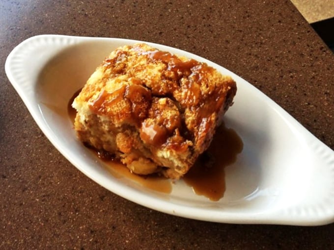 Bread pudding that looks like it would make angels weep&mdash;caramelized edges giving way to a tender center bathed in caramel sauce.