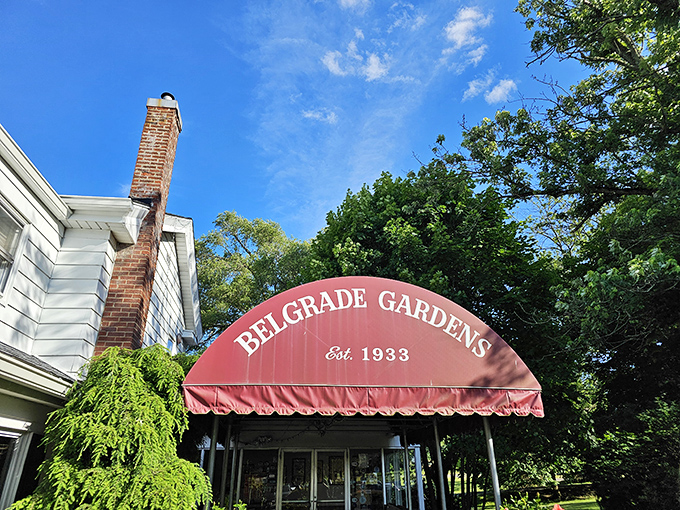 That signature burgundy awning against blue Ohio skies&mdash;a beacon of fried chicken excellence that's been calling to hungry travelers since 1933.