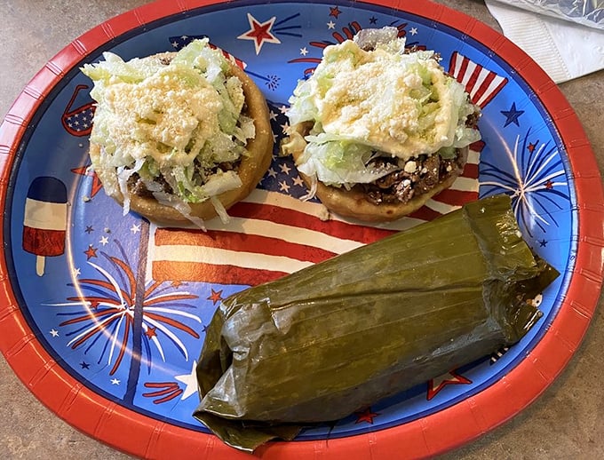 A patriotic plate holding the diplomatic relations between cultures&mdash;traditional tamales and sopas creating an international summit of flavors worth celebrating.