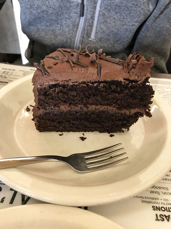 Chocolate cake so rich it should have its own tax bracket&mdash;the perfect finale to a diner experience that reminds you why classics never go out of style.