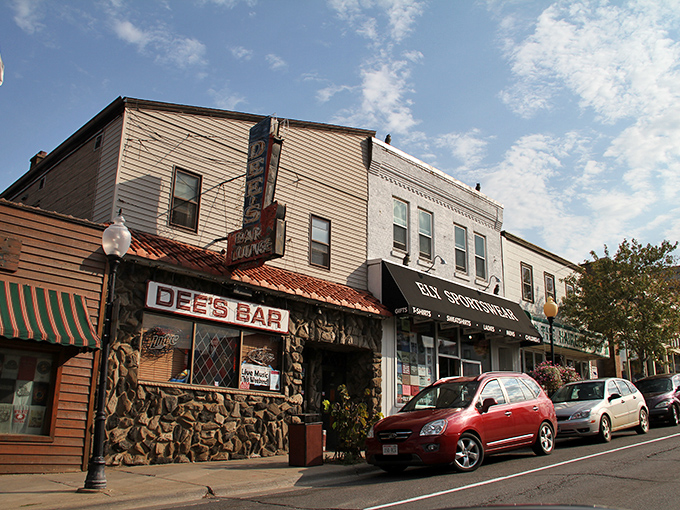 Dee's Bar anchors a street where wilderness stories get taller with each round, and strangers become friends over local brews.