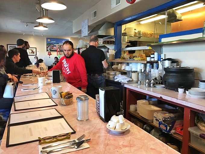 Where the magic happens &ndash; the counter and kitchen area buzz with activity, promising plates of happiness delivered with a side of New Mexican hospitality.