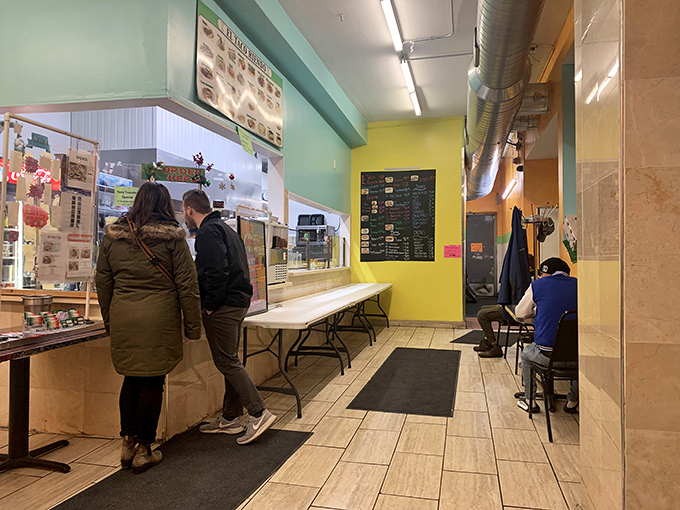 The ordering counter&mdash;where dreams are placed and fulfilled. That menu on the wall isn't just decoration; it's a promise of good things to come.