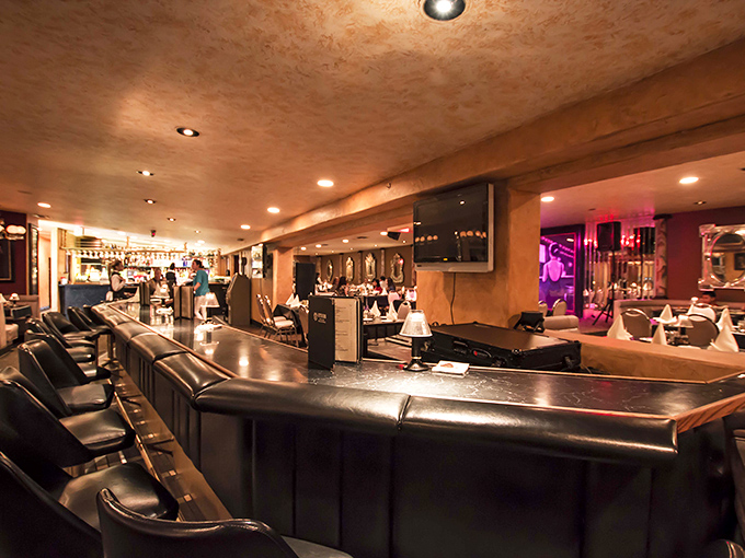 The bar where martinis are properly cold, Old Fashioneds properly muddled, and conversations flow as smoothly as the premium spirits behind the counter.