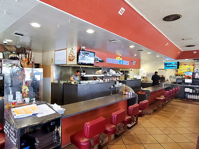 Where the breakfast magic happens. Counter seating lets you witness the choreography of short-order cooking at its finest.